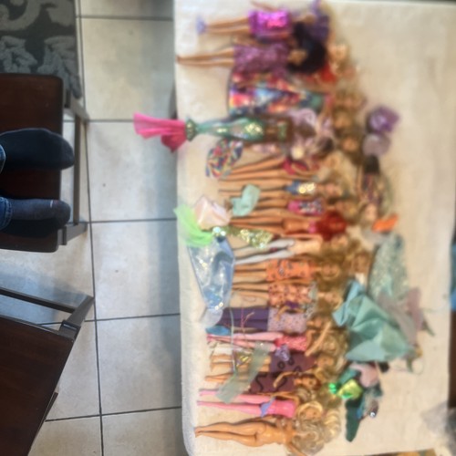 Assorted Barbies Different Styles Some With Clothes and extra clothes ...