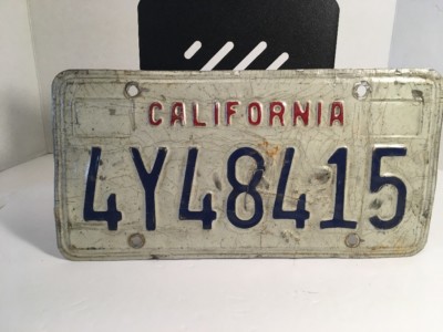1990'S CALIFORNIA LICENSE PLATE WITH RED STATE LETTERS AND BLUE TAG ...