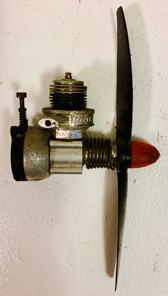 Collectible Cox .049 model airplane engine with Quit Zone Muffler ...