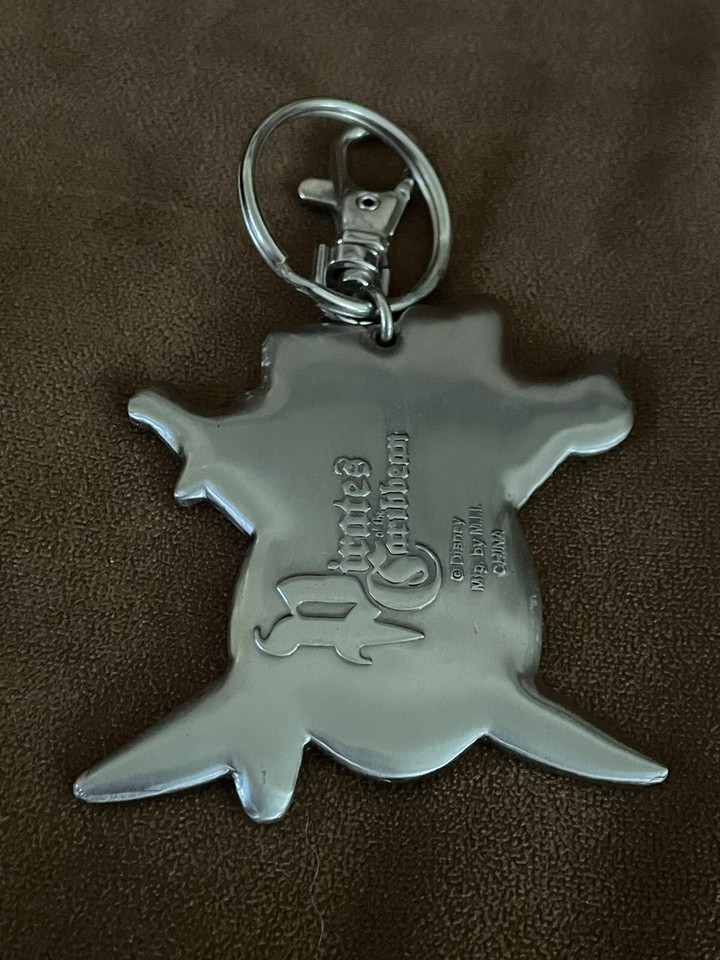 Disney Pirates Of The Caribbean Keychain SkullSword Metal Collectible ...