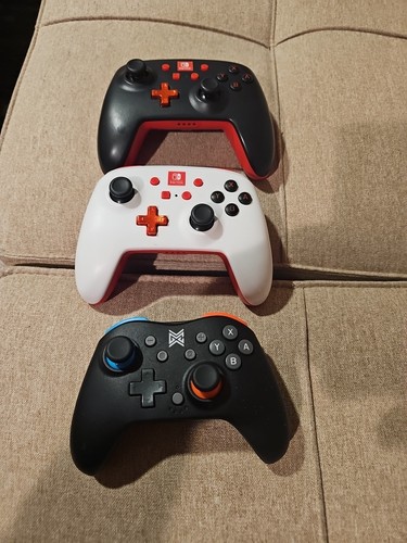 3× Two Power, a white and red wireless controller Nintendo switch ...