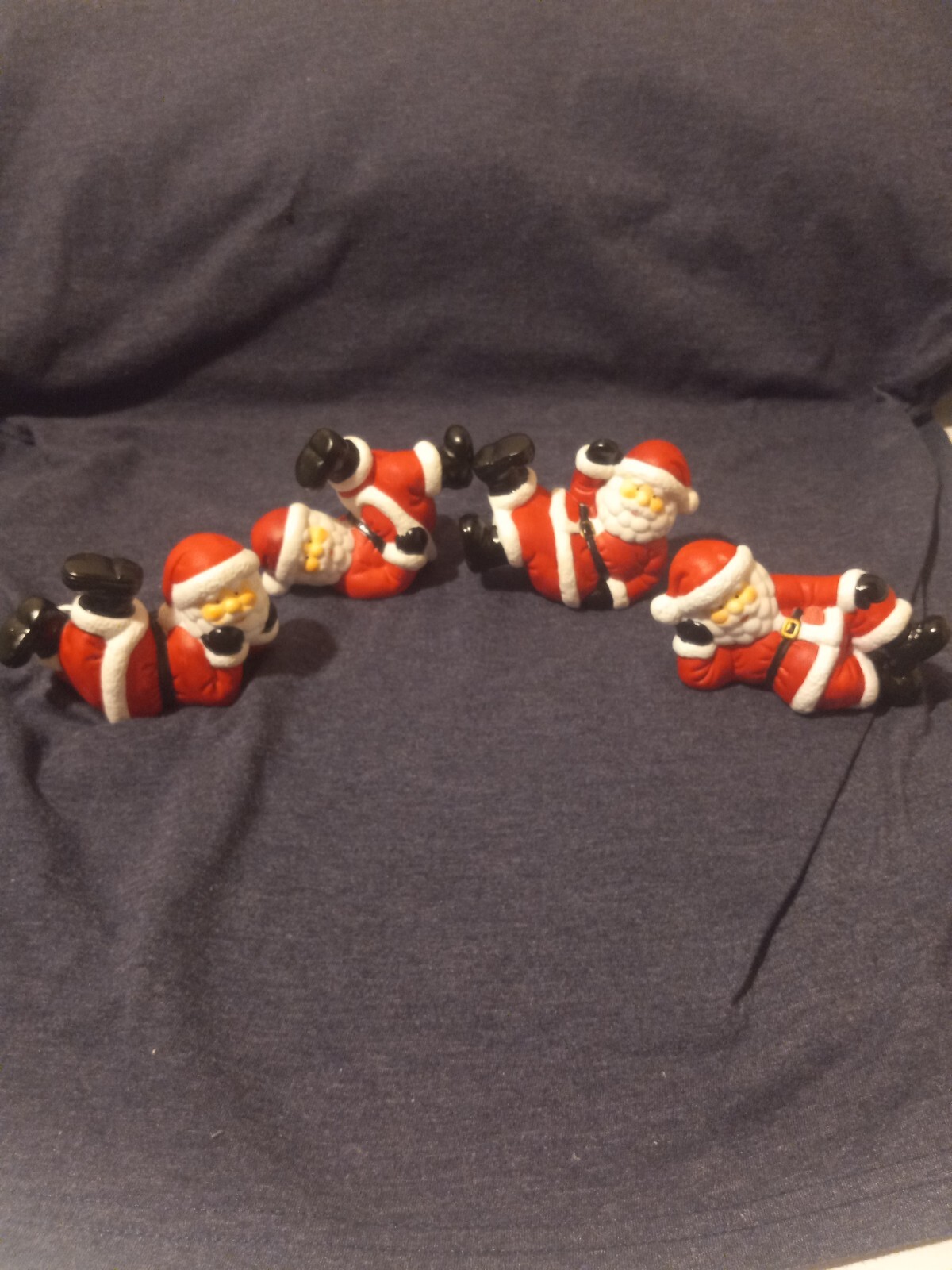 Set Of 4 Tumbling Cerramic Santa Claus Christmas Figurines | eBay