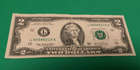low serial 2 dollar bill w some wear series 2003a | eBay
