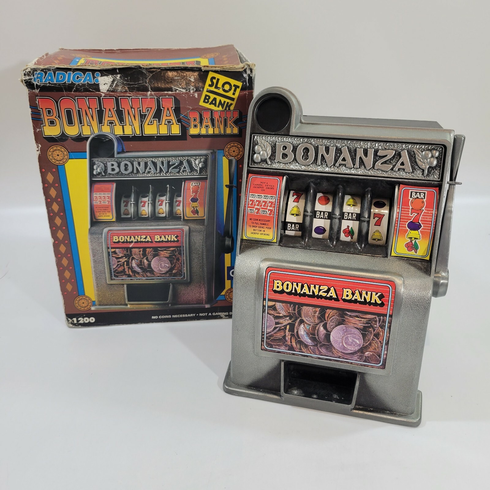 COLLECTABLE RADICA BONANZA DIE CAST 4 REEL BANK/ SLOT MACHINE WITH ...