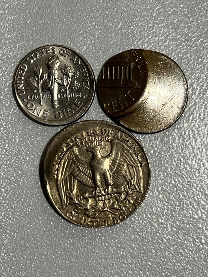 Off Center Coins With Dates: 1985P Quarter, 2005P Dime, 1982P Penny ...