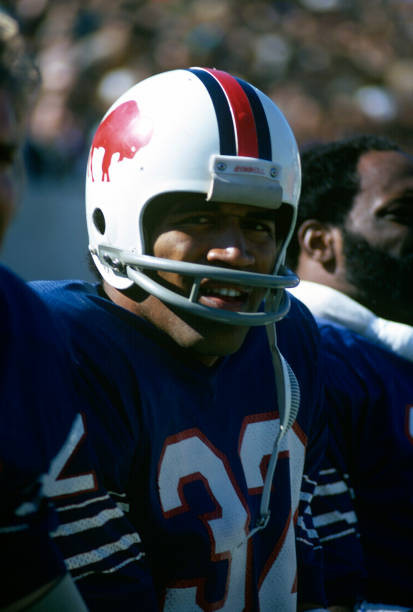 Running back OJ Simpson Buffalo Bills looks on from the bench - 1973 ...