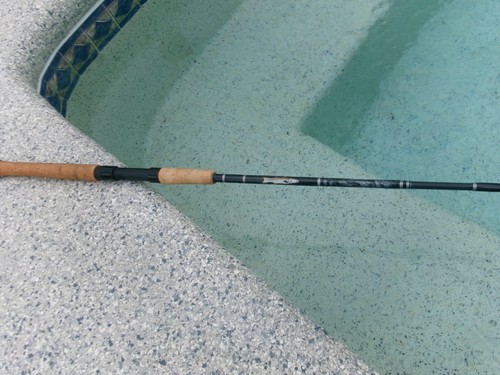 New, custom built, 7'6" 10-20 lb. spinning rod w/hand woven Snook image ...