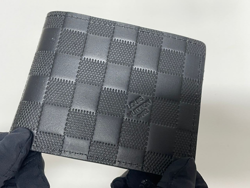 Authentic LOUIS VUITTON Black Damier Infini Leather Multiple Bifold ...