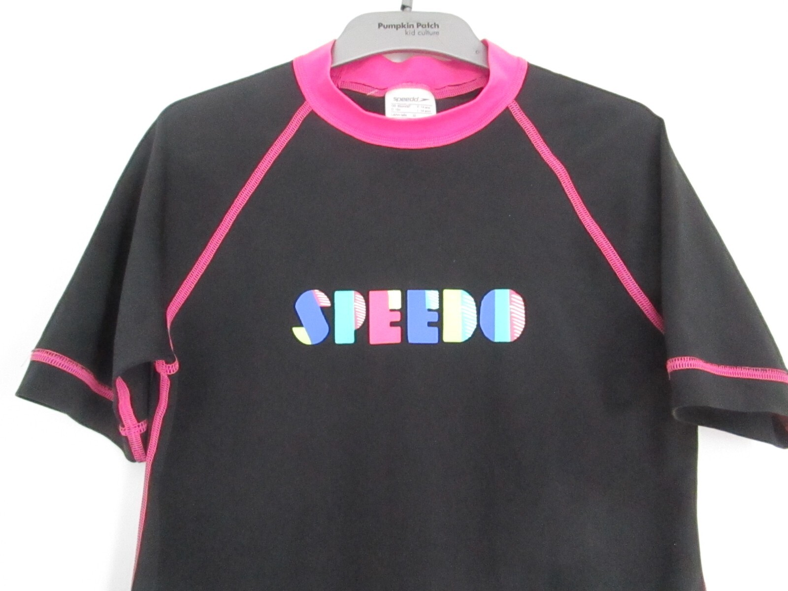 Girls size 12 Speedo Endurance+ short sleeve rash vest sun top black ...