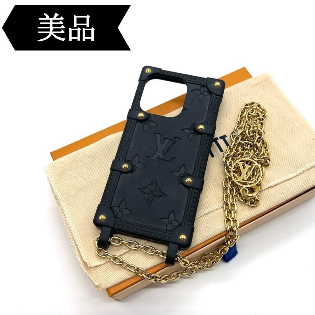 LOUIS VUITTON Monogram Embossed Retrunk iPhone 14 Pro Case LOUIS VUITTON Monogram Embossed Retrunk iPhone 14 Pro Case