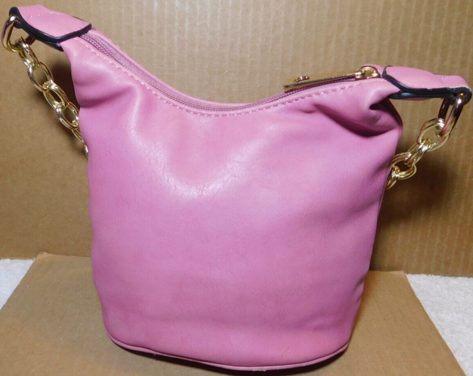 Unbranded~Pink Handbag/ Purse With Hole Punches Design on Outside | eBay