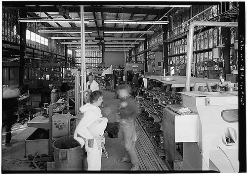 120. Iron worker wearing white protective suit with ventilating helmet ...