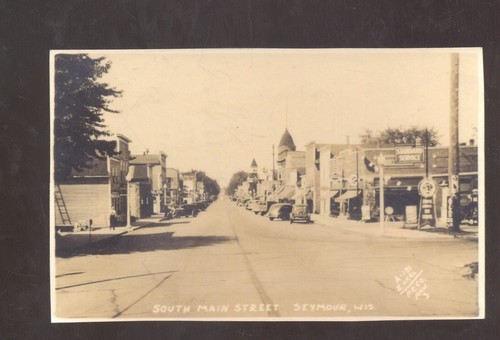 REAL PHOTO SEYMOUR INDIANA DOWNTOWN STREET SCENE GAS STATION POSTCARD ...