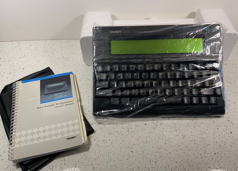 Tandy WP-2 Portable Word Processor - with case, user guide, runs on AA ...