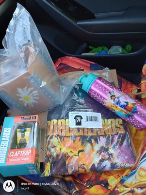Borderlands merch, water bottle, lrg t-shirt , popcorn dynamite box ...