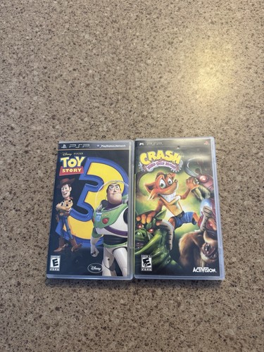 Lot Of Two PSP Games Toy Story 3 And Crash Mind Over Mutant Both ...