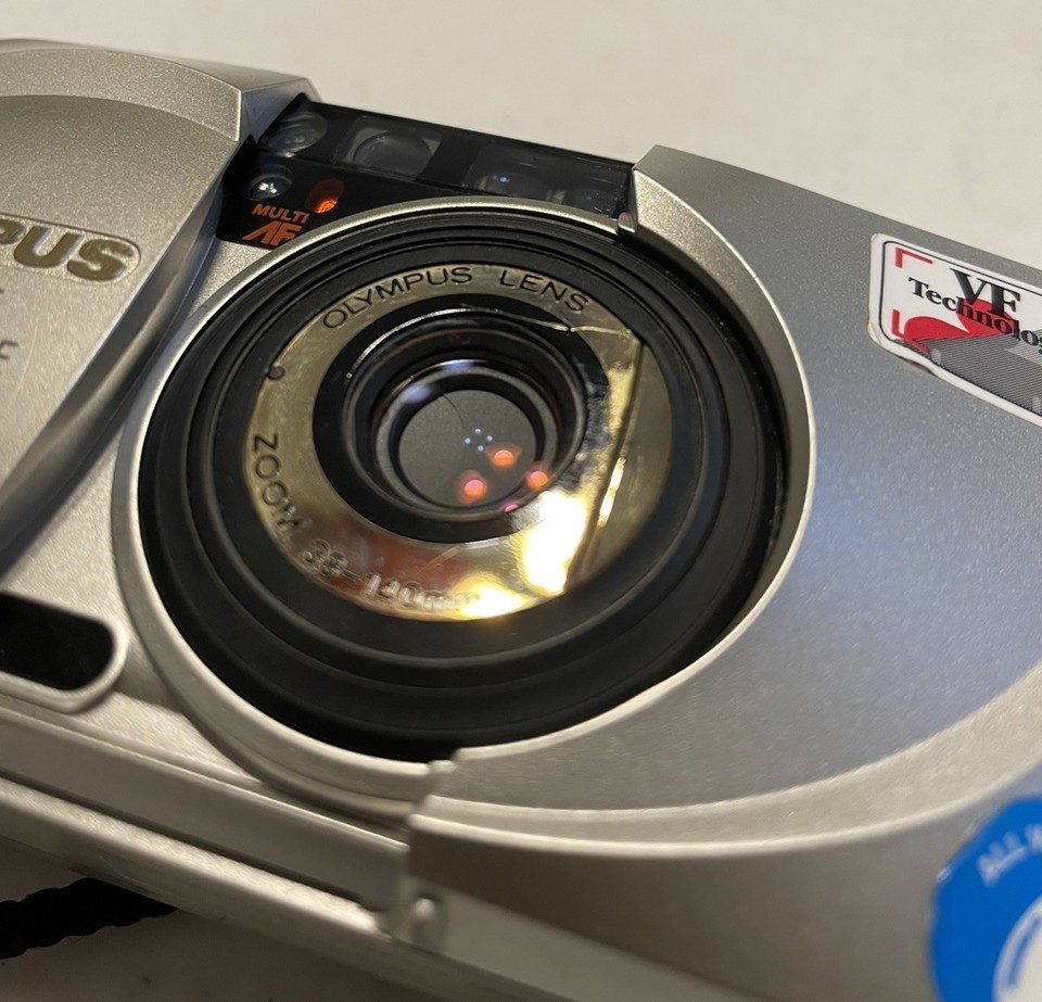 Olympus Infinity Stylus Zoom 140 DLX Film Camera 38-140mm Lens w/ Strap ...