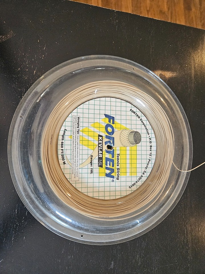 FORTEN, MADE WITH KEVLAR 16L GAUGE TENNIS STRING REEL, USED A FEW TIMES ...