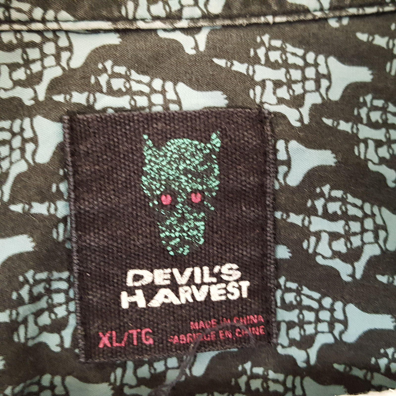 Devils Harvest Skeleton Hand - Middle Finger - Button… - Gem