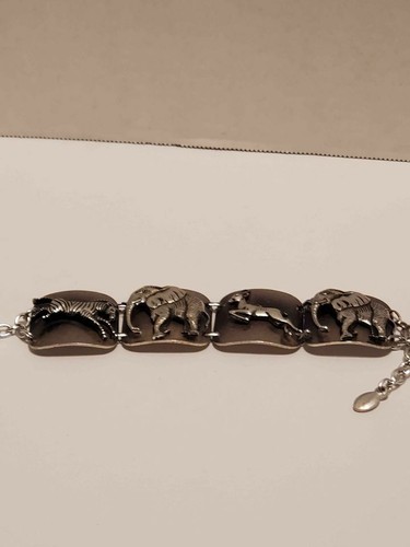 Wide silver tone animal bracelet 7" (B147) - Gem