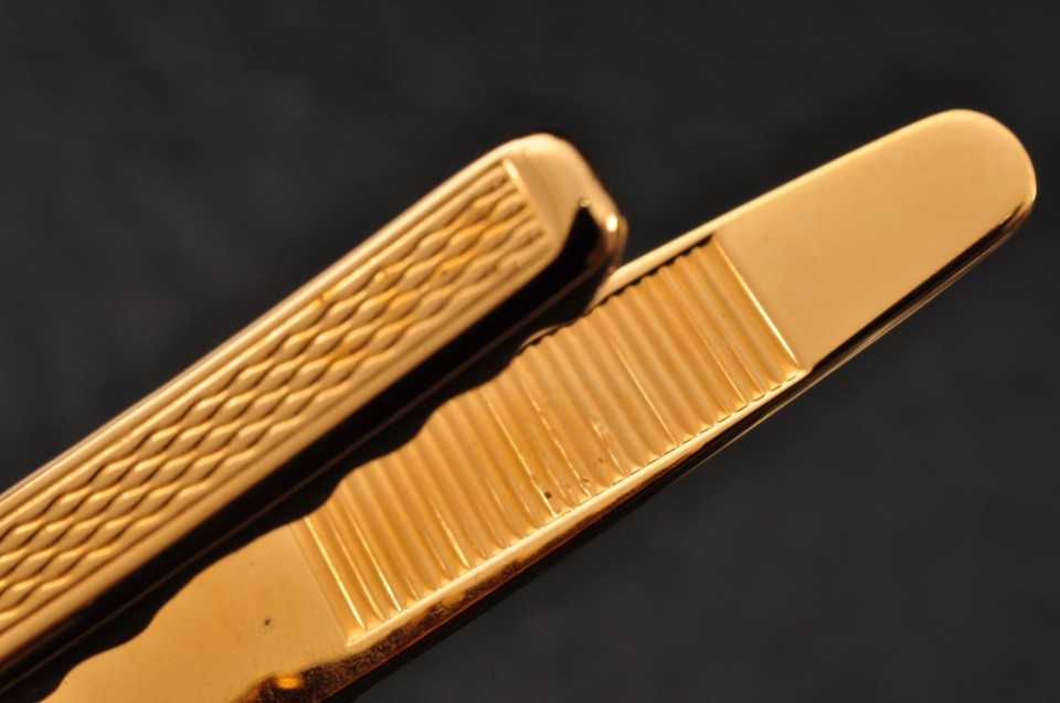 Near mint, "Dunhill" cufflinks and tie clip green and gold color brand ...