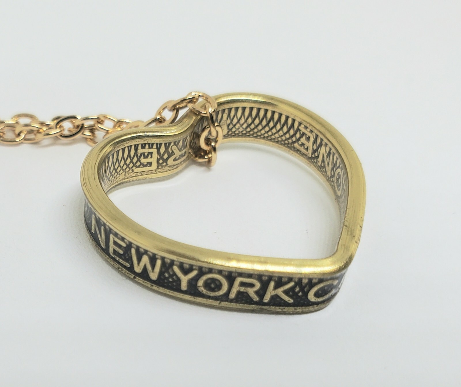 Heart Pendant made from New York City subway transit token coin ring | eBay