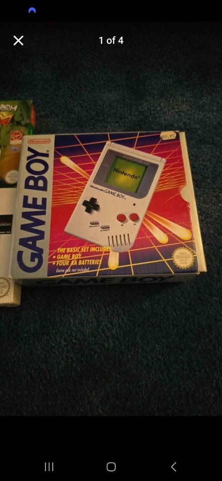 Original Gameboy In Box. Good condition . Minimal damage to Box ...