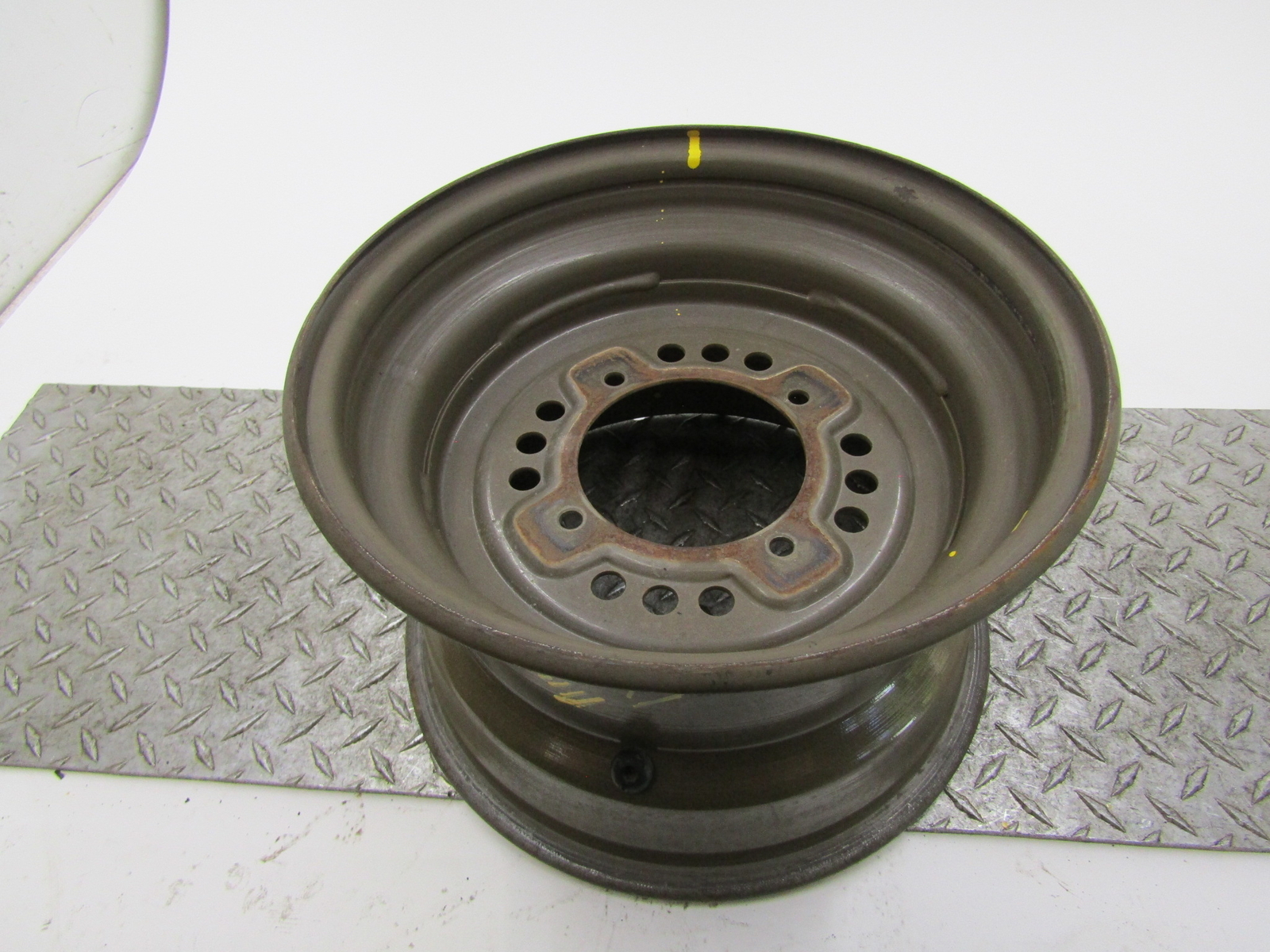 2003 KAWASAKI PRAIRIE 360 REAR WHEEL RIM #1 12X7.5 HAS A BEND IN THE ...