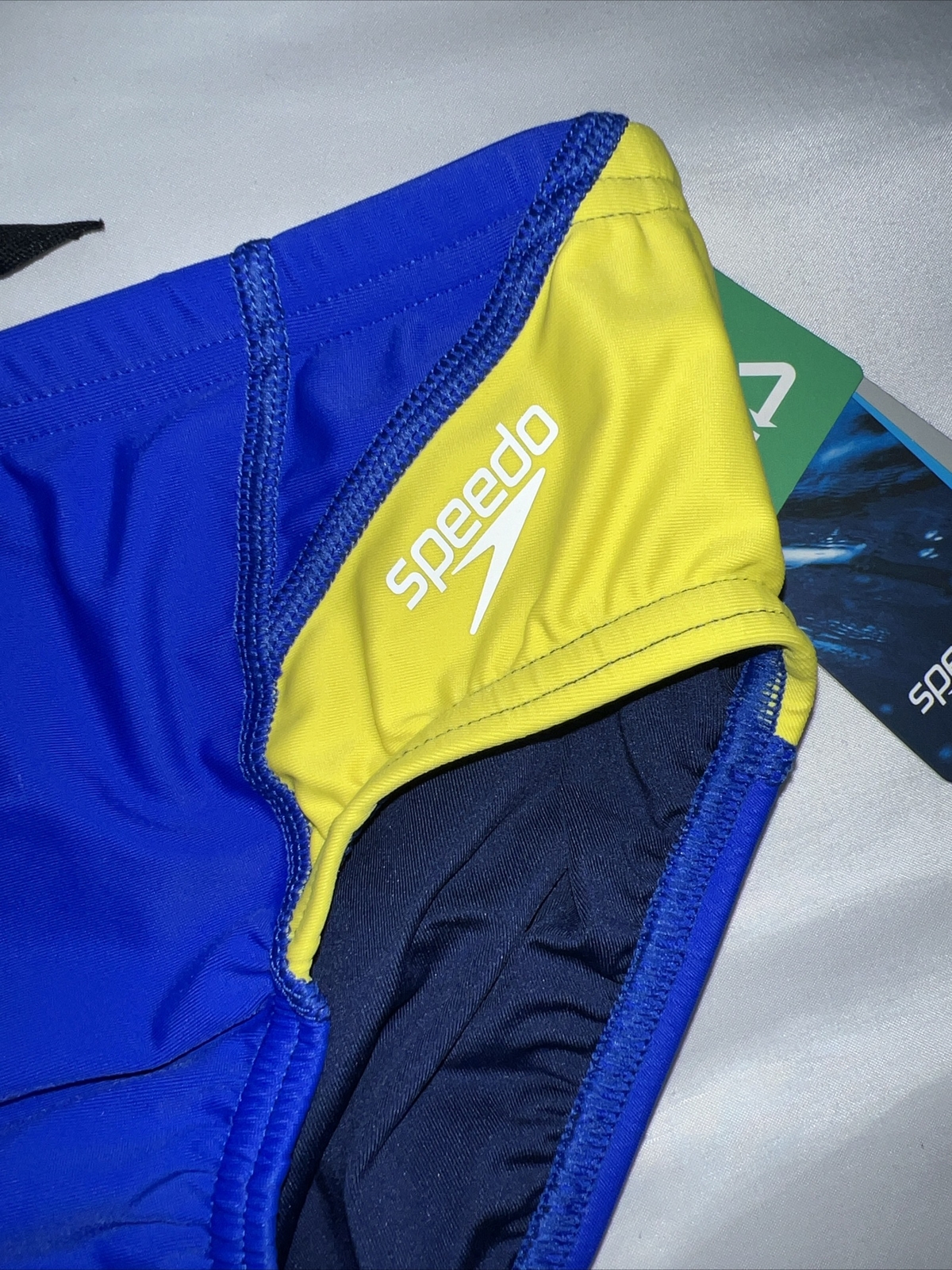 Men’s Speedo Bikini Swim Brief, Printed PowerFlex Eco, Sapphire/Gold ...