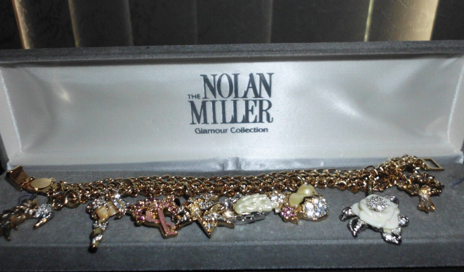 Nolan Miller 8" Goldtone Charm Bracelet - Gem