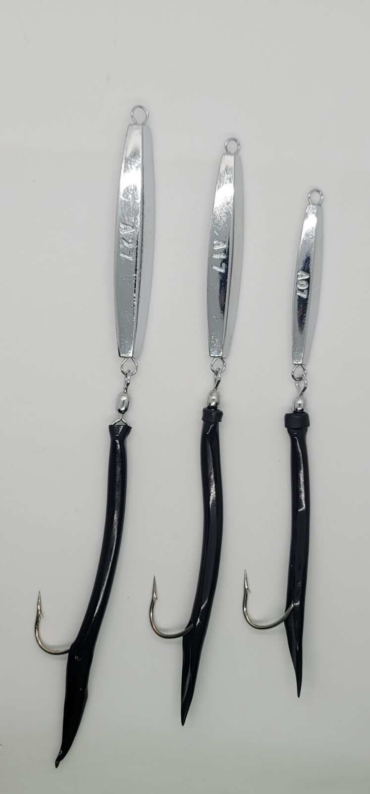 3 New Ava Diamond Jigs 1,2,3oz Split Tube Tails Bluefish Striper ...