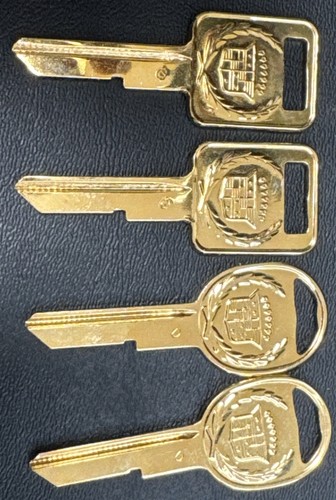 Set of 4 uncut Gold Cadillac Keys black sleeve | eBay