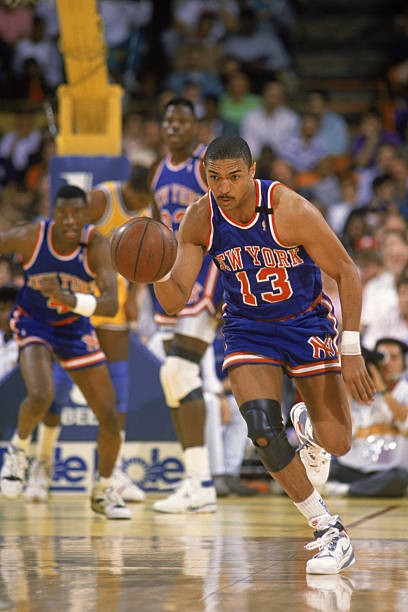 Mark Jackson New York Knicks leads the fast break at an NBA game a- Old ...