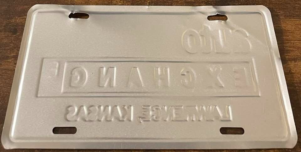 Auto Exchange Dealership Booster License Plate Lawrence Kansas Dealer ...