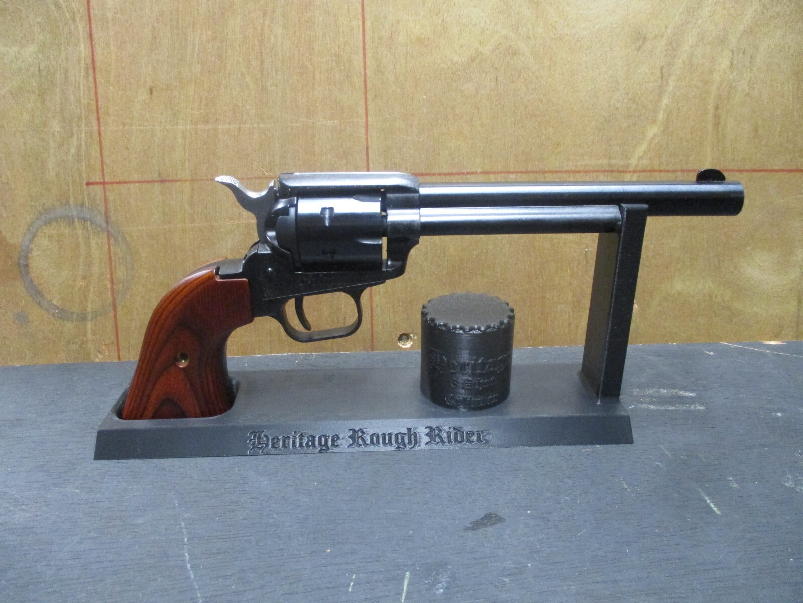 Heritage Rough Rider revolver stand with cylinder case.