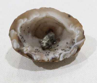 Beautiful Natural agate crystal geode cave with a silver bear in it ...