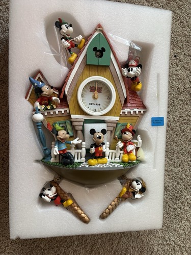 Disney Mickey Mouse Through The Years Cuckoo Clock with Lights Music ...