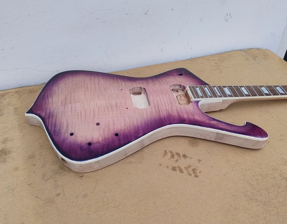 Iceman Guitar by Christopher Scott. Flamed maple to solid mahogany body ...