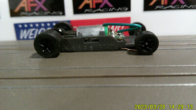 AFX RACING H.O. SCALE MEGA G+ 1.7 NARROW CHASSIS BLACK STAR RIMS NEW | eBay
