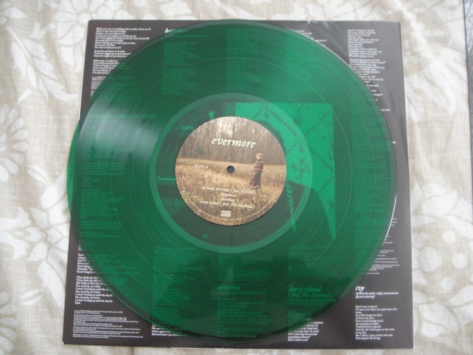 Taylor Swift vinyl LP "Evermore" (green colored vinyl)......EXCELLENT ...