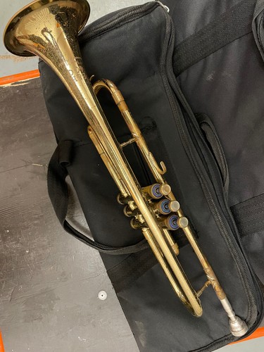 B&H 400 Trumpet in soft case. Tarnished. Would benefit from a service ...