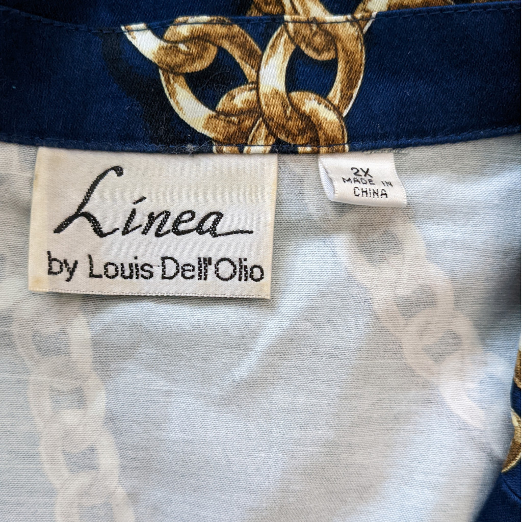 Linea by Louis Dell' Olio gold chains on blue jacket … - Gem
