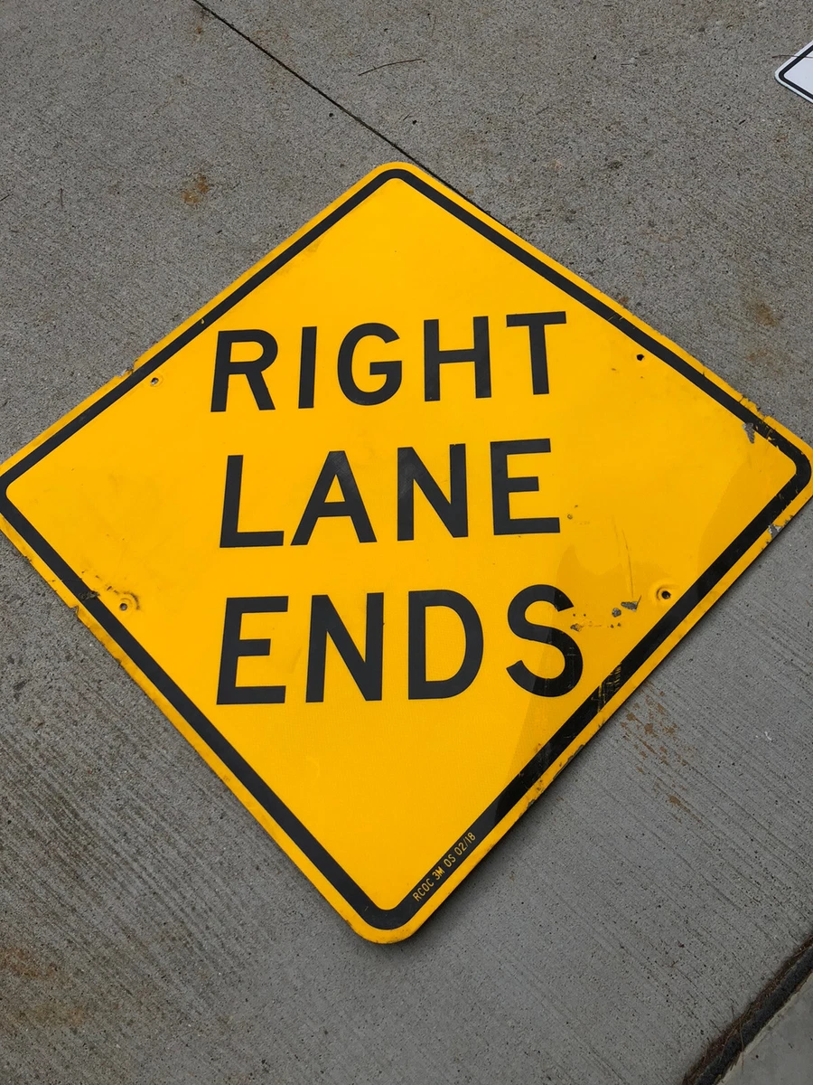 Left Lane Ends Sign