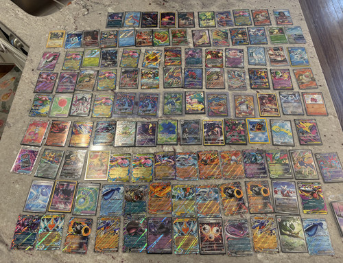 Pokemon Card Lot NM 100+ cards Charzard all in sleeves Storage unit ...