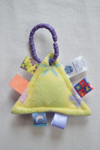 Take Along Taggies Triangle Plush Squeaks Flowers Yellow Purple Fleece ...