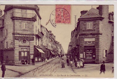 CPA 50 près Pontorson AVRANCHES La Rue de la Constitution Magasins ...