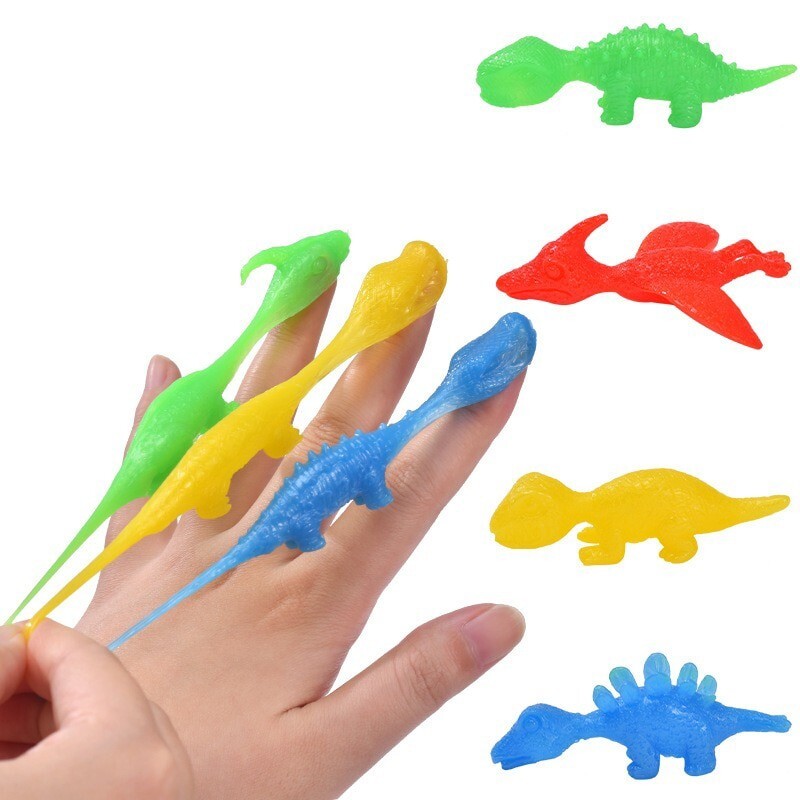 10 X Sticky Dinosaurs Slinshot Dino Catapult Finger Toy Elastic Flying ...