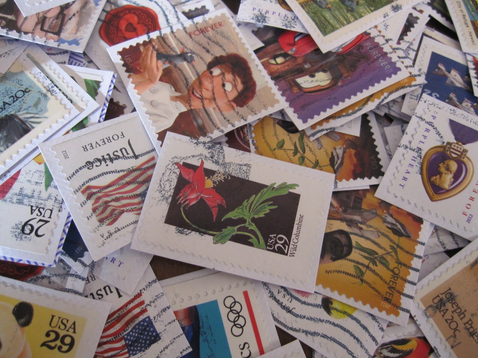 LOT OF 1000 BULK USED/CANCELLED U.S. POSTAGE STAMPS ON PAPER | eBay