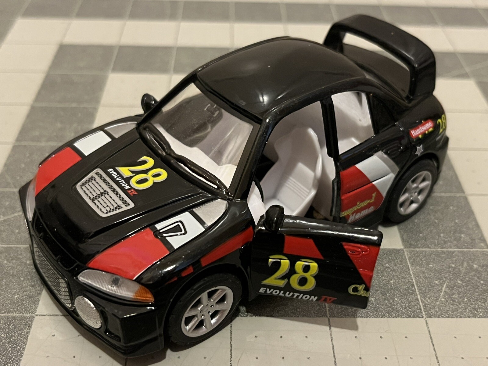 Kinsfun Racing Black Mitsubishi Evolution IV Toy Car Pull Back DieCast ...