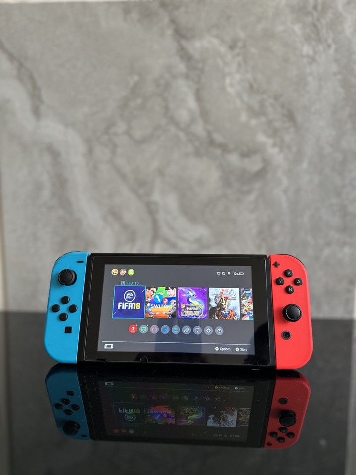 Nintendo Switch Bundle With Accessories And Games | eBay UK
